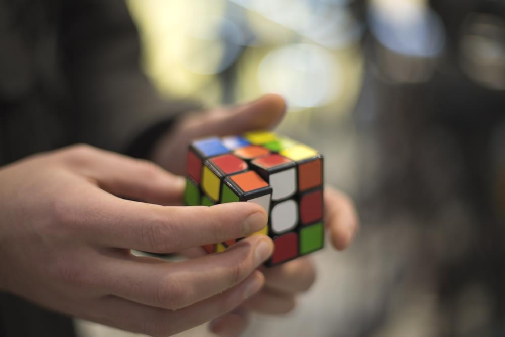 New World Record For Solving A Rubik’s Cube While On A Pogo Stick ...